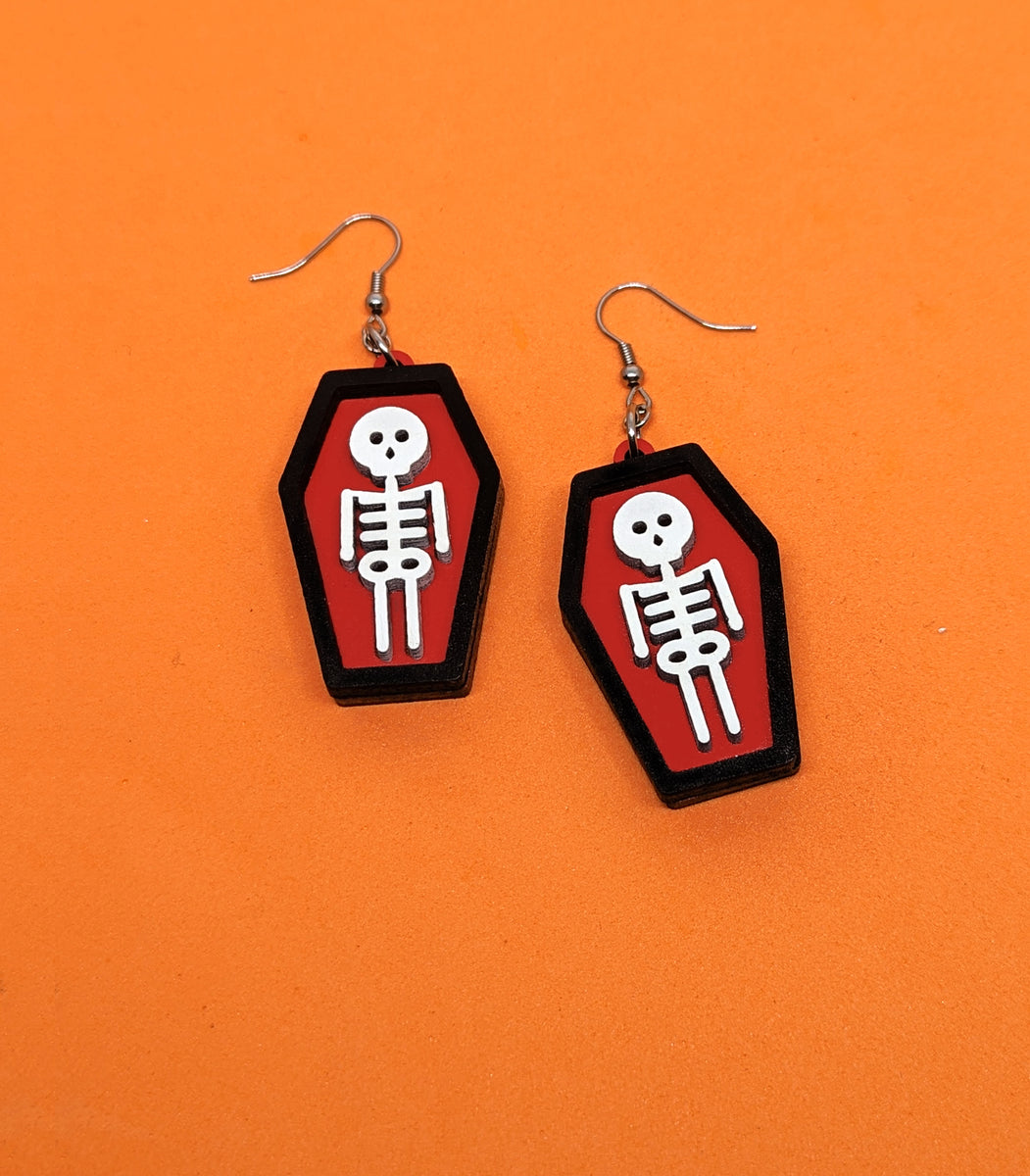 Skeleton in Coffin Dangle Earrings – [un]possible cuts